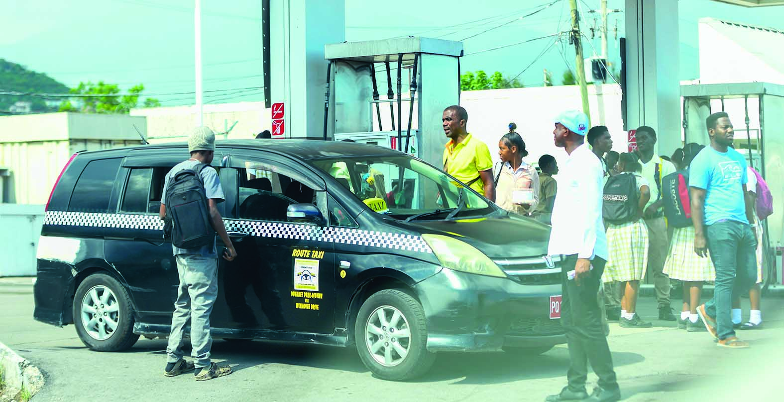RISKING DISASTER - Students, commuters turn gas stations into gathering ...