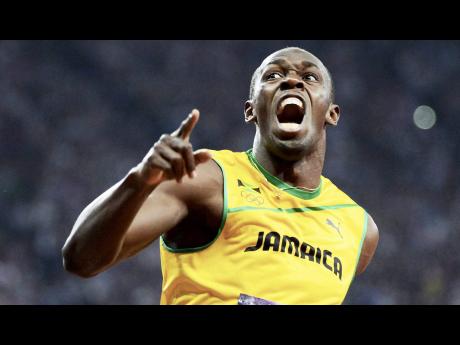 Bolt the ‘greatest’ – Michael Johnson | Sports | Jamaica Gleaner