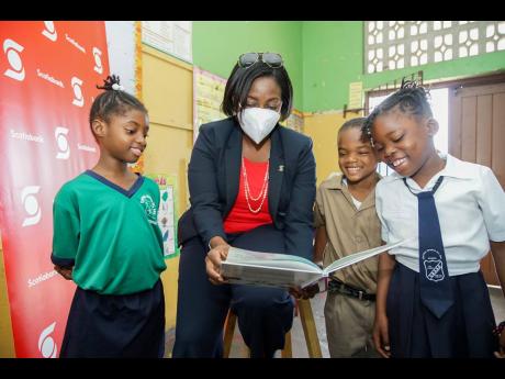 Corporate Hands | Scotiabank volunteer reads to children | News ...